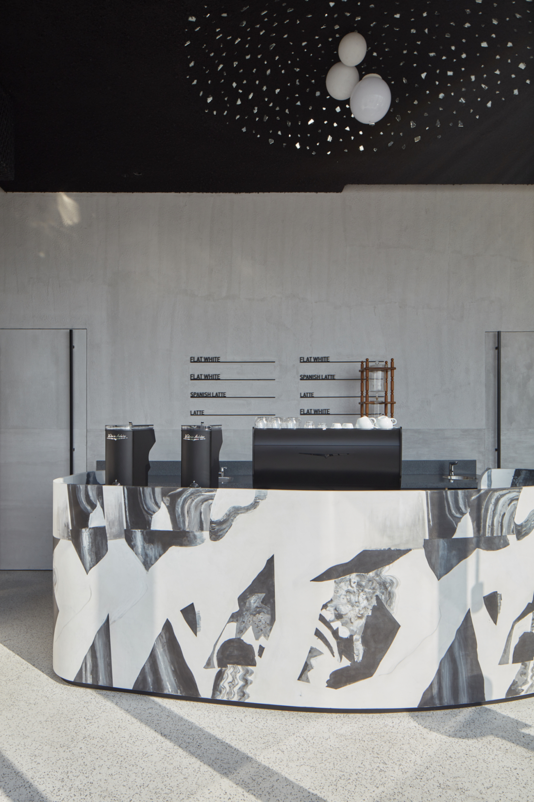 Roar designs Drop’s first outpost in Abu Dhabi: A monochrome, texture ...